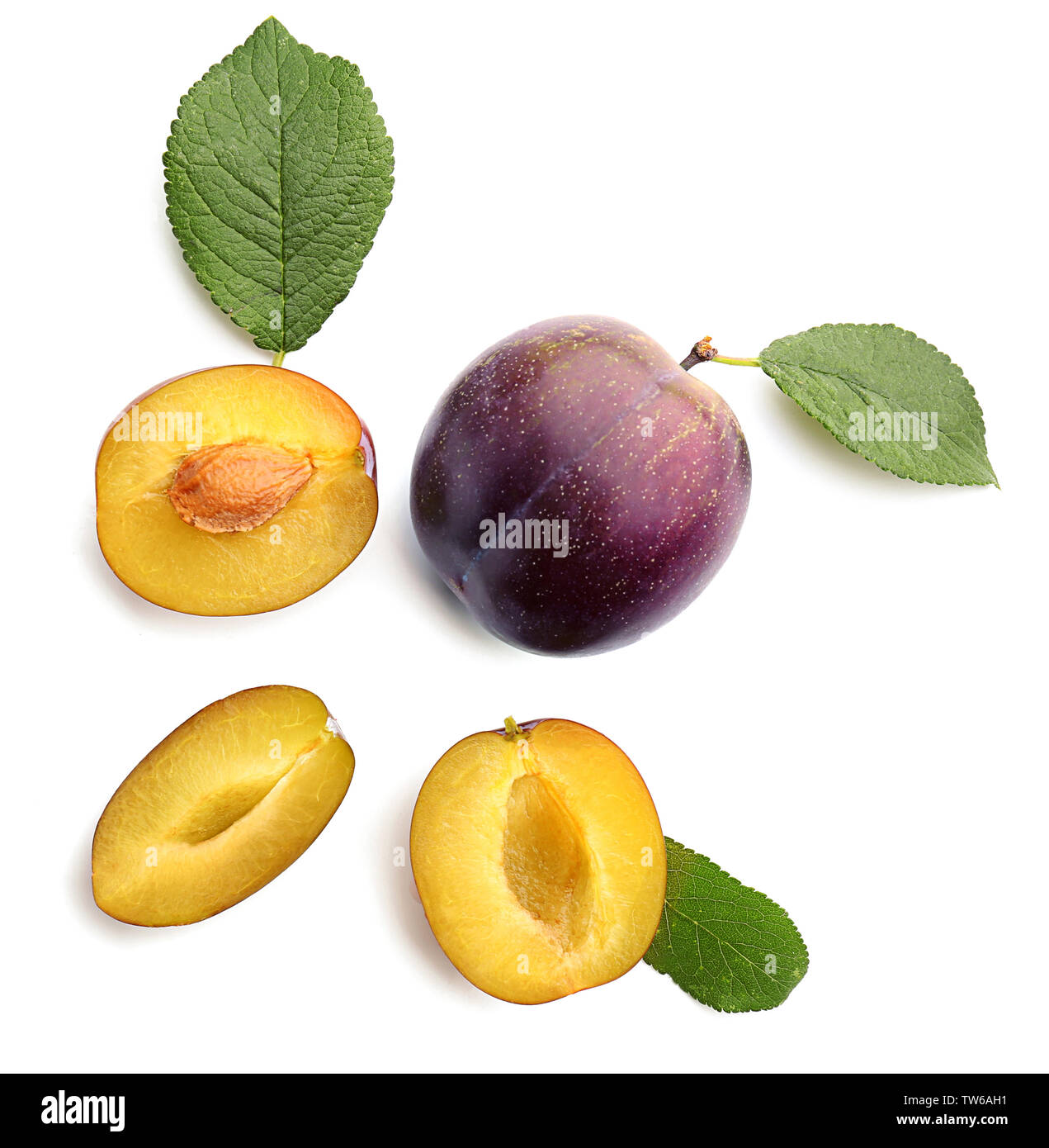 Fresh ripe plums on white background Stock Photo - Alamy