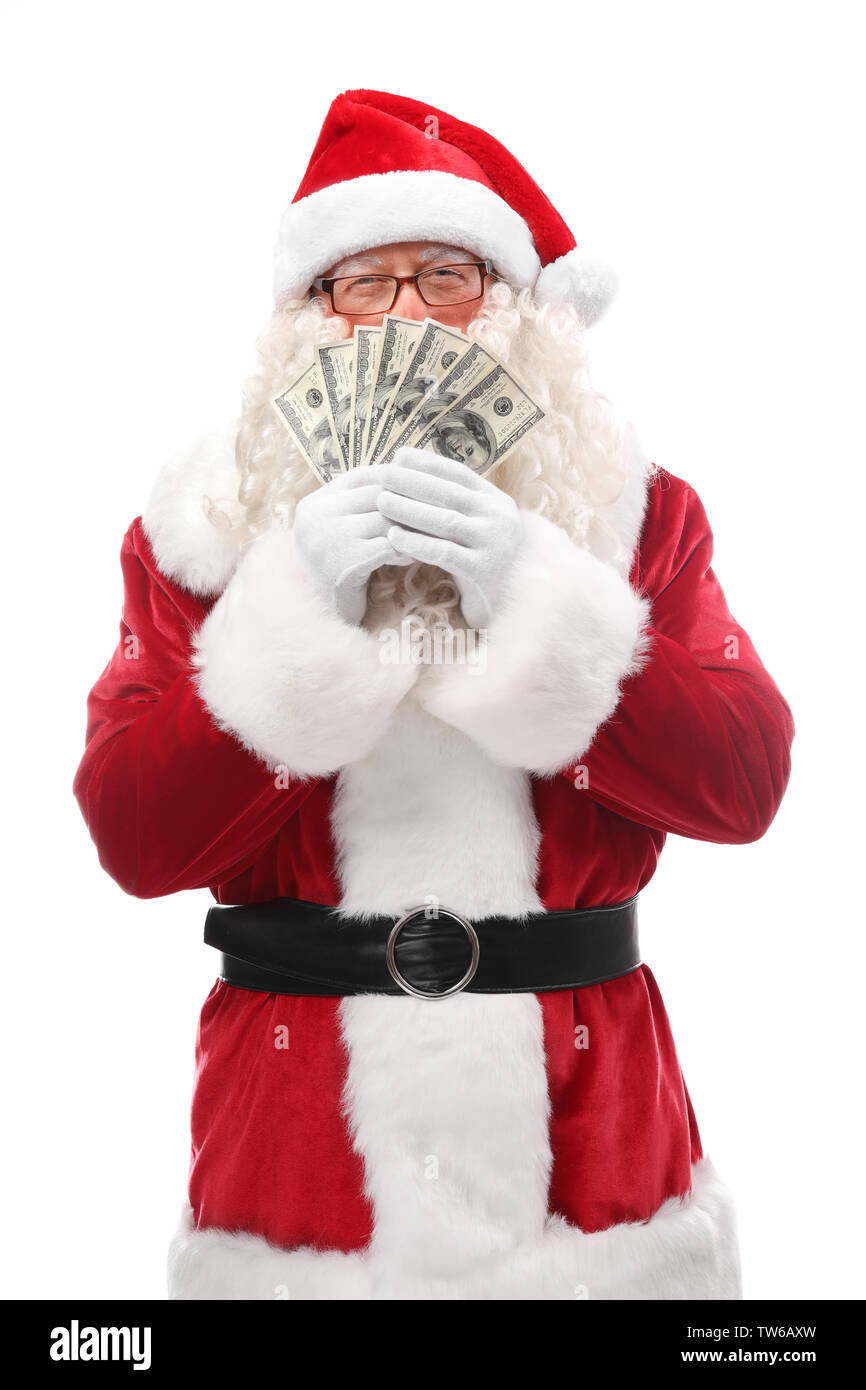 Santa Claus holding money on white background Stock Photo - Alamy