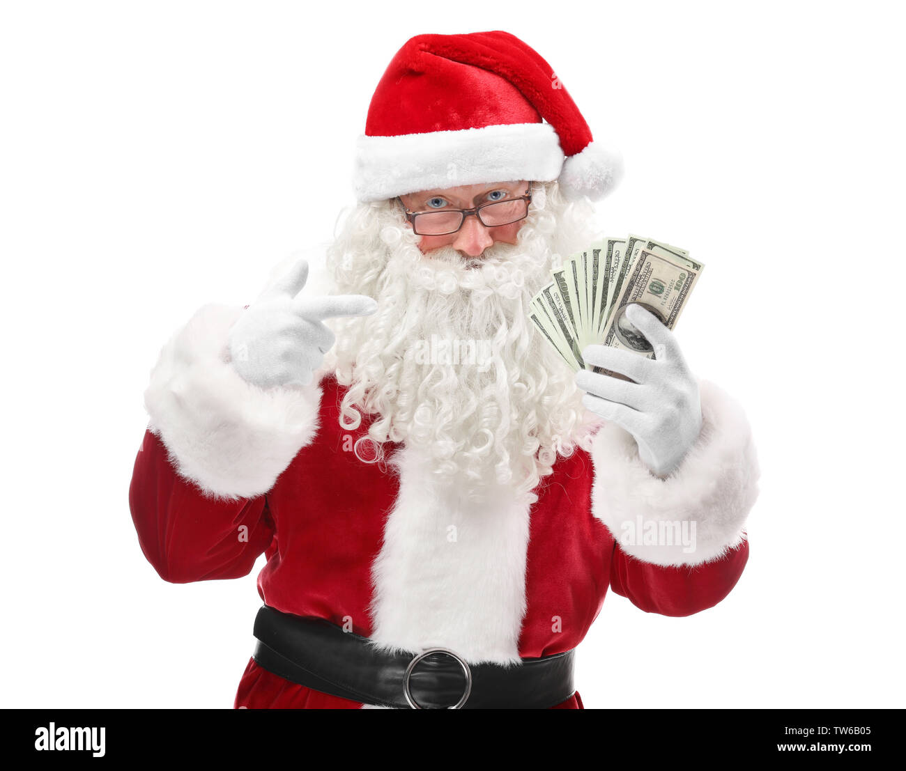 Santa Claus holding money on white background Stock Photo - Alamy