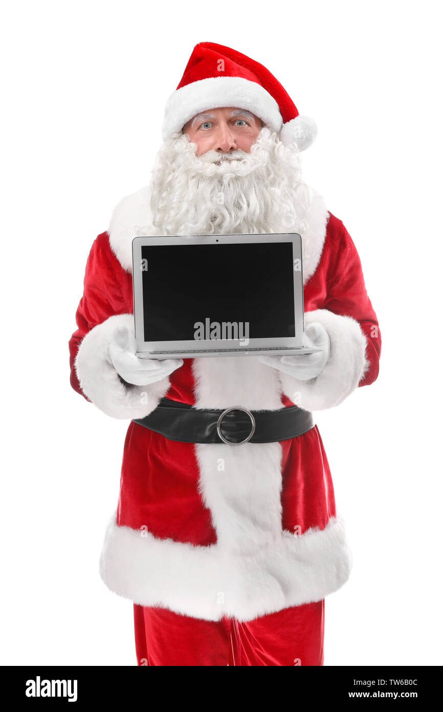 Santa Claus holding laptop on white background Stock Photo - Alamy