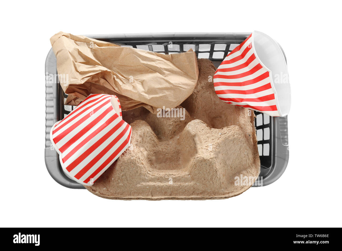 Plastic container with paper garbage on white background Stock Photo ...