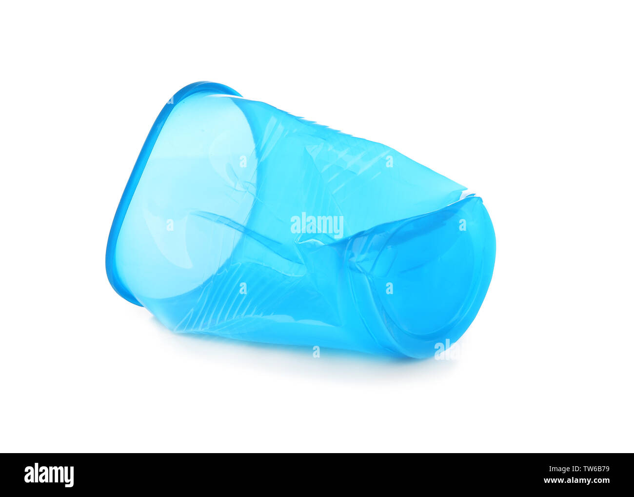 Crushed plastic cup on white background Stock Photo - Alamy
