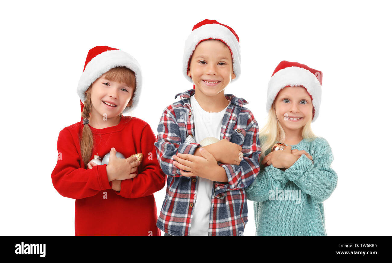 Cute little children with Christmas decor on white background Stock ...