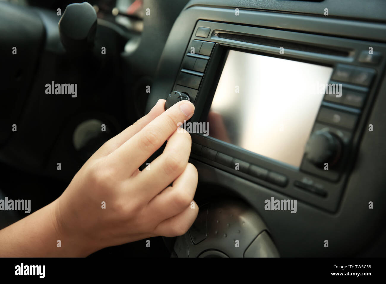 Car radio female hand hi-res stock photography and images - Alamy