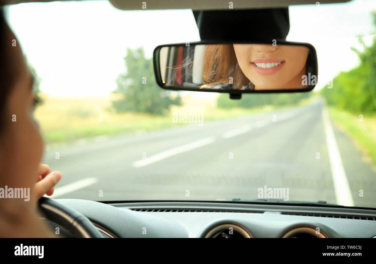 Looking in rear view mirror hi-res stock photography and images - Alamy