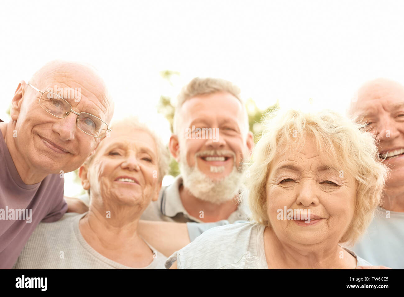 Group of elderly people outdoors Stock Photo - Alamy