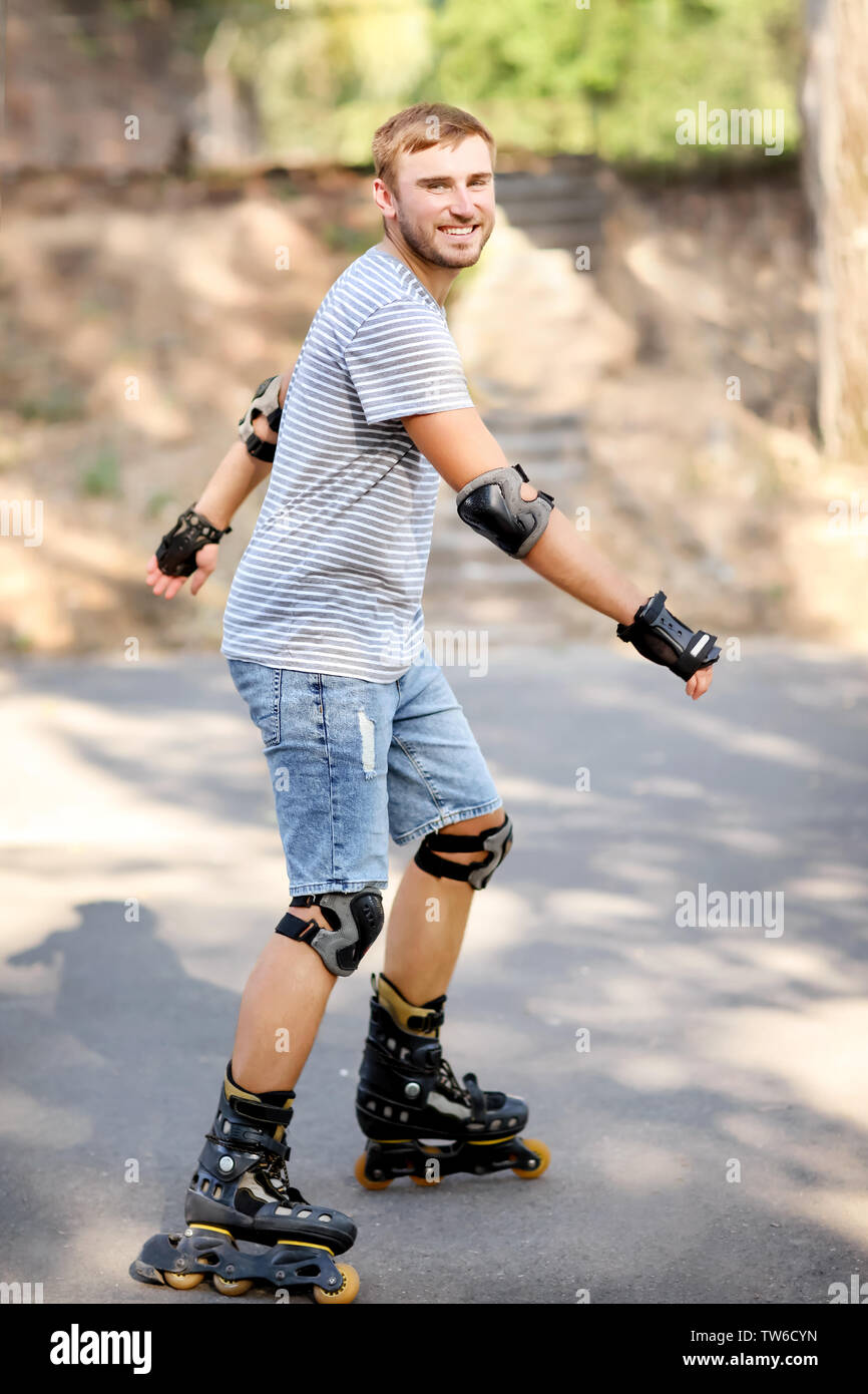 Young caucasian man roller skating hi-res stock photography and images ...