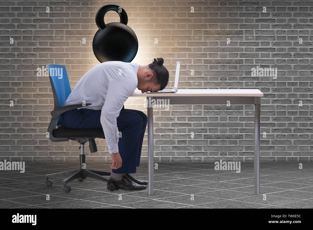 Employee with burden of work Stock Photo - Alamy