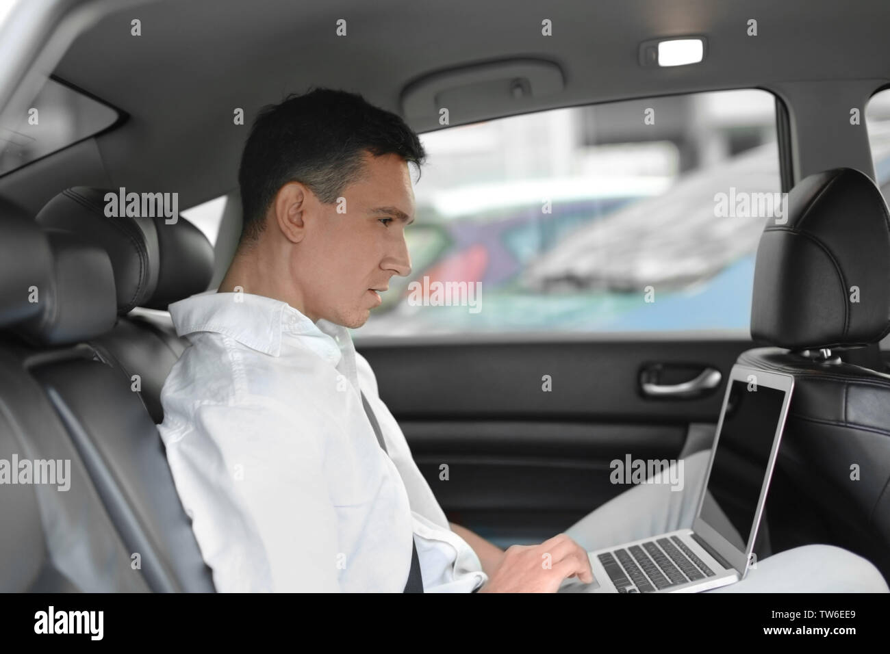 Owner person laptop car hi-res stock photography and images - Alamy