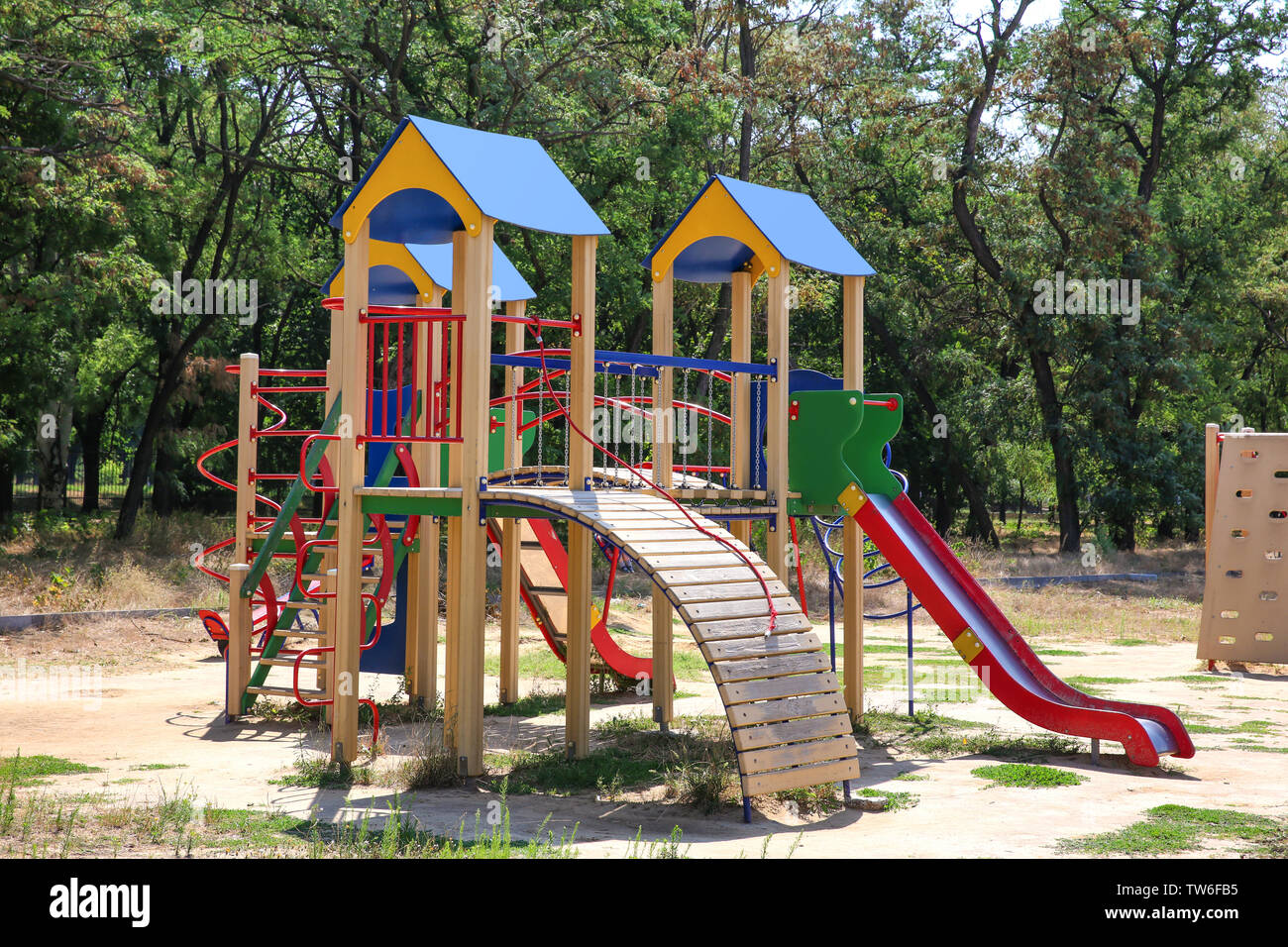 Empty children playground in park Stock Photo - Alamy