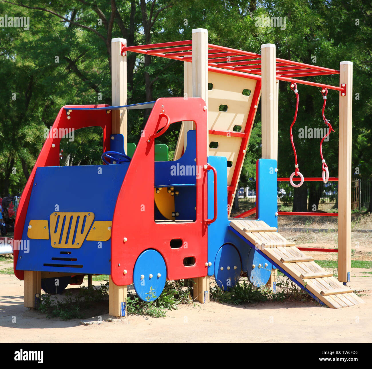 Empty children playground in park Stock Photo - Alamy