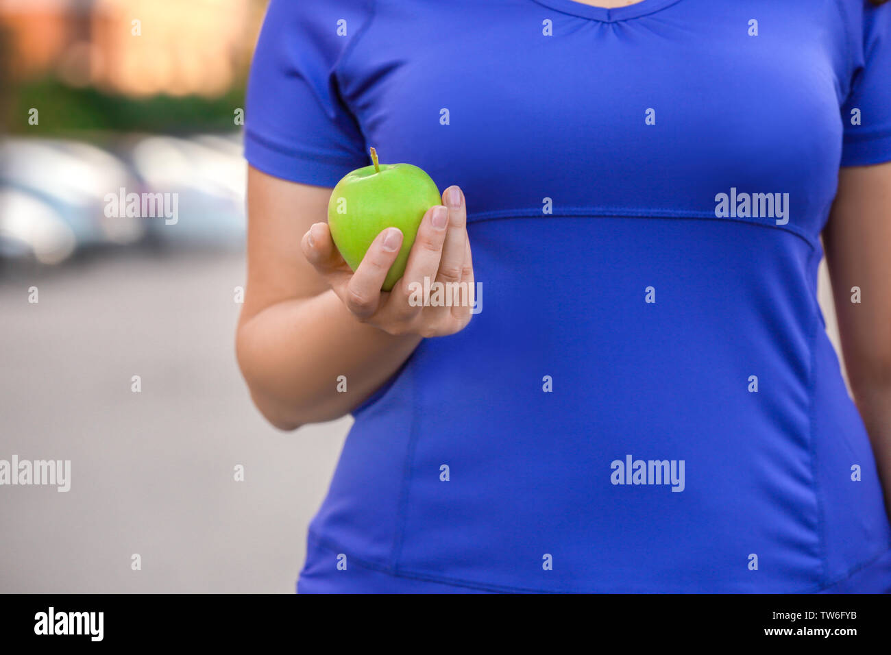Obesity concept green apple hi-res stock photography and images - Alamy
