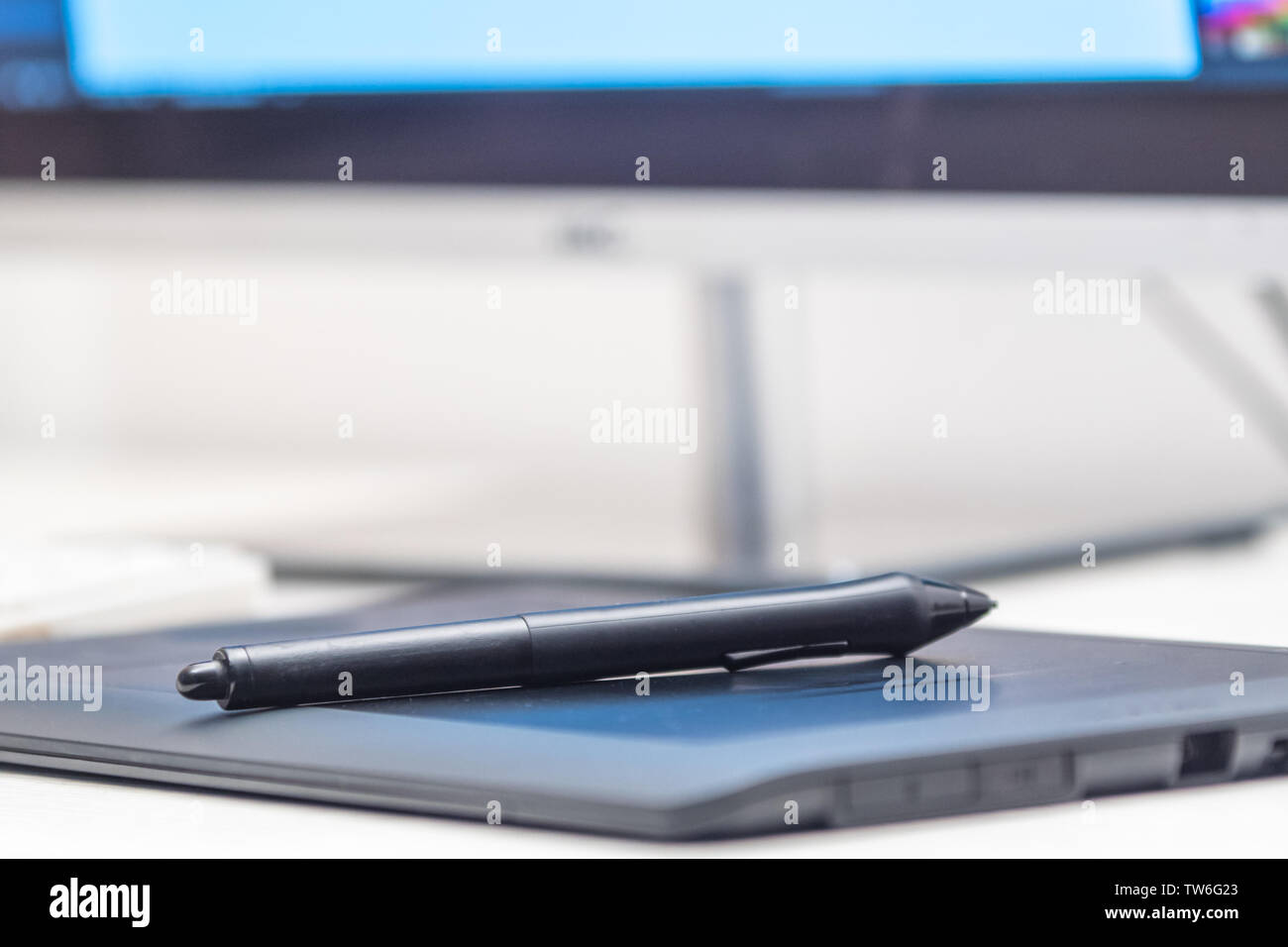 tablet pen on the office table Stock Photo - Alamy