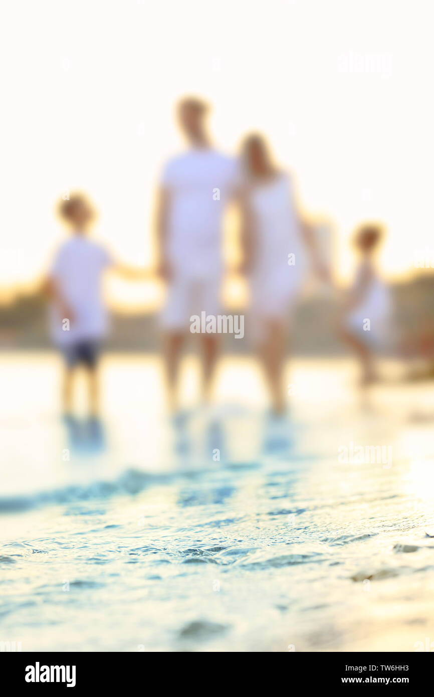 Couple and children and blurred hi-res stock photography and images - Alamy