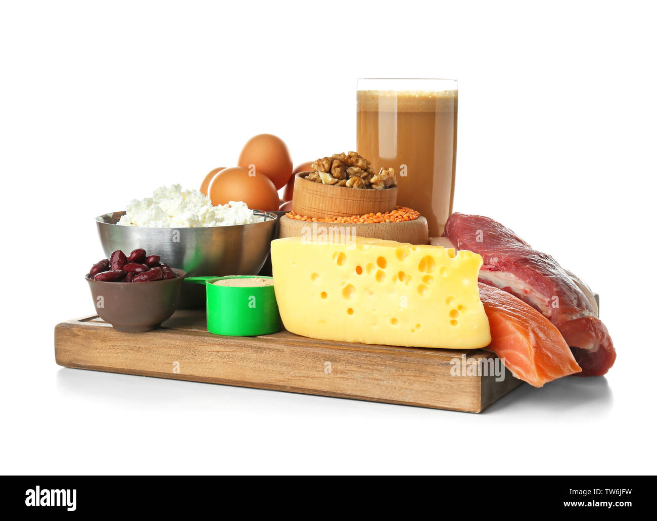 High protein food and powder on white background Stock Photo - Alamy