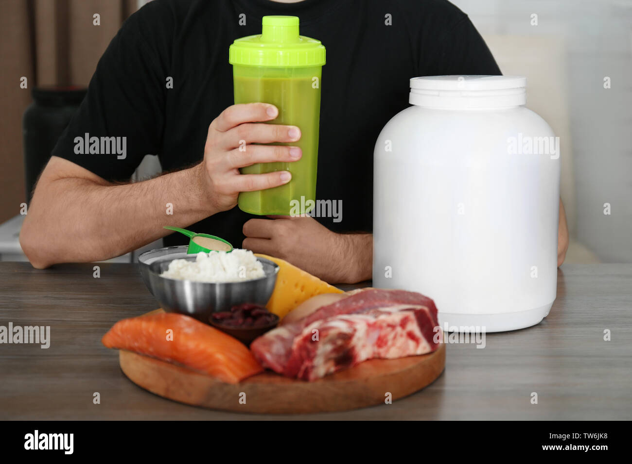 Man holding protein shake hi-res stock photography and images - Alamy