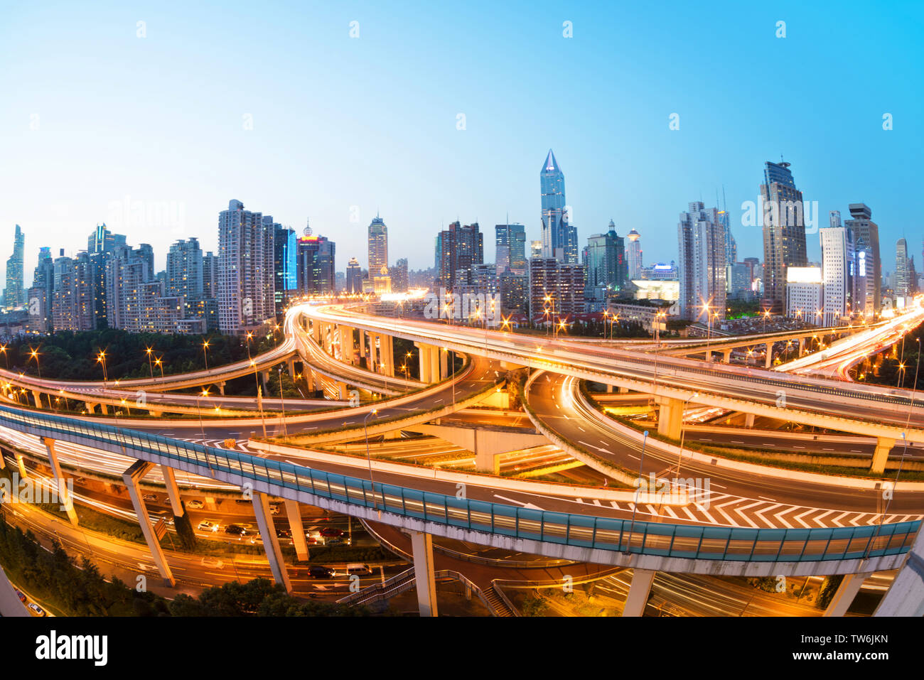 illuminated traffic on elevated expressway in modern city Stock Photo ...