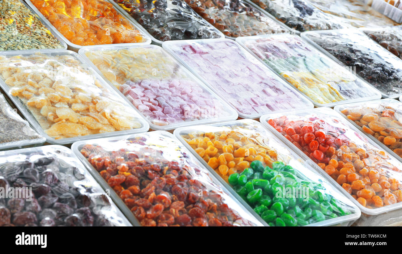 Different delicious sweets at market Stock Photo - Alamy