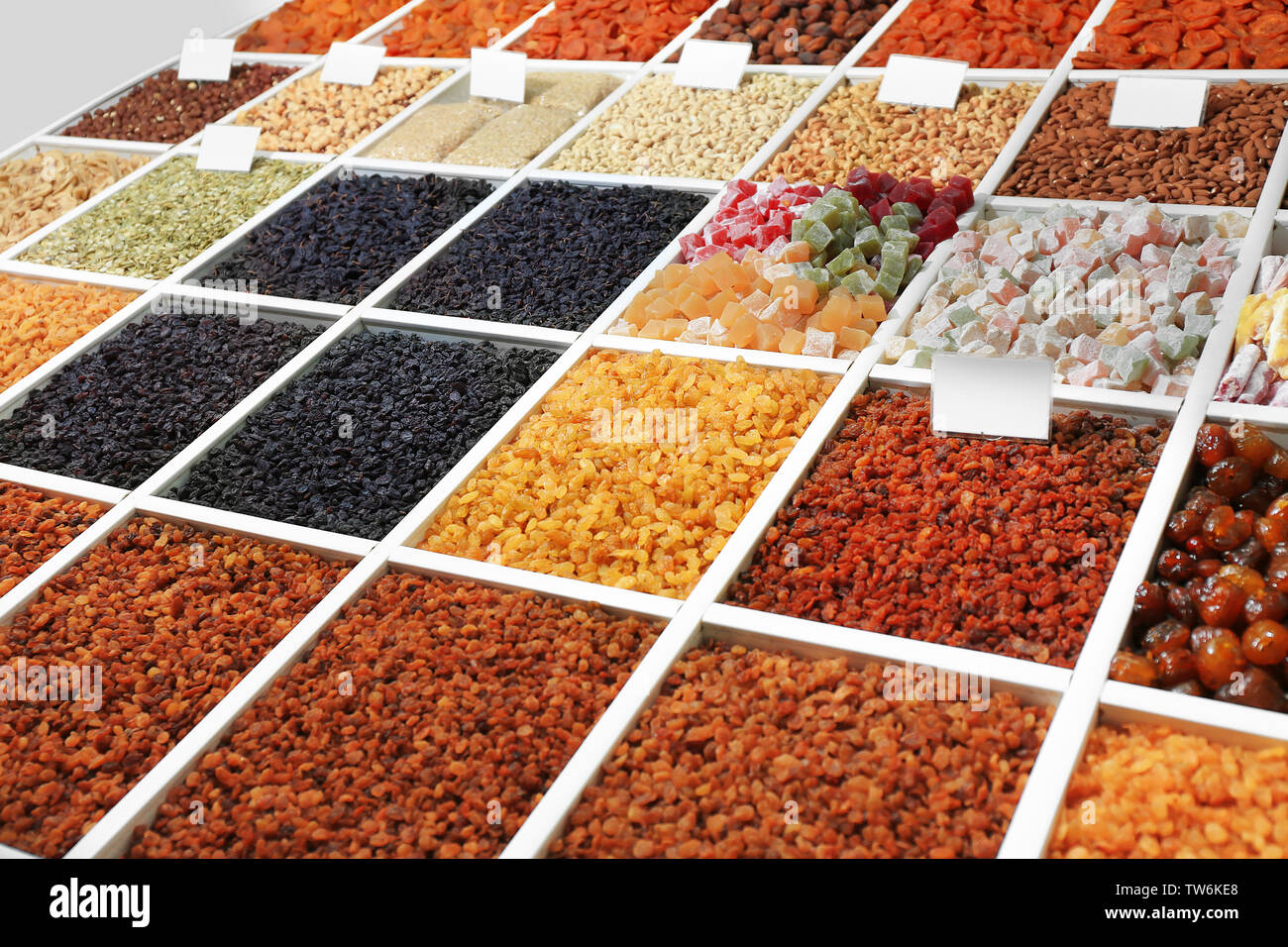 Display with different foodstuff at market Stock Photo - Alamy