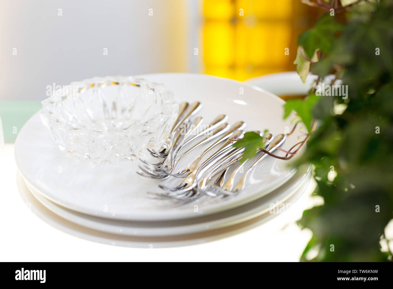 Clean plates photography and cutlery Stock Photo - Alamy