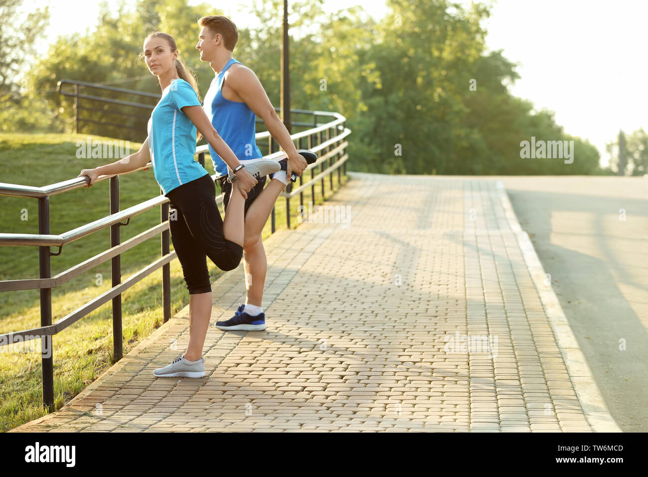 Sporty couple doing morning hi-res stock photography and images - Alamy