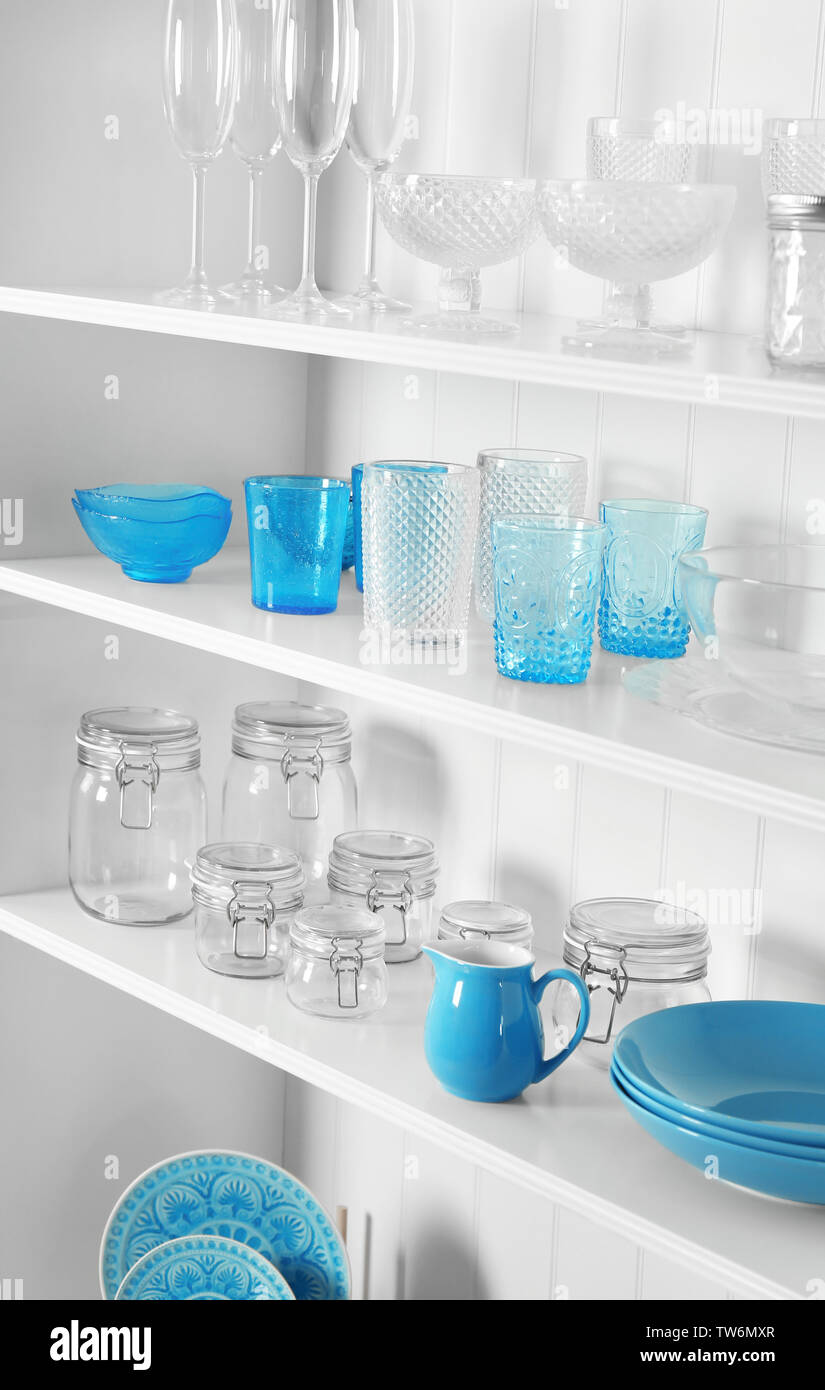 White storage stand with glassware in kitchen Stock Photo - Alamy