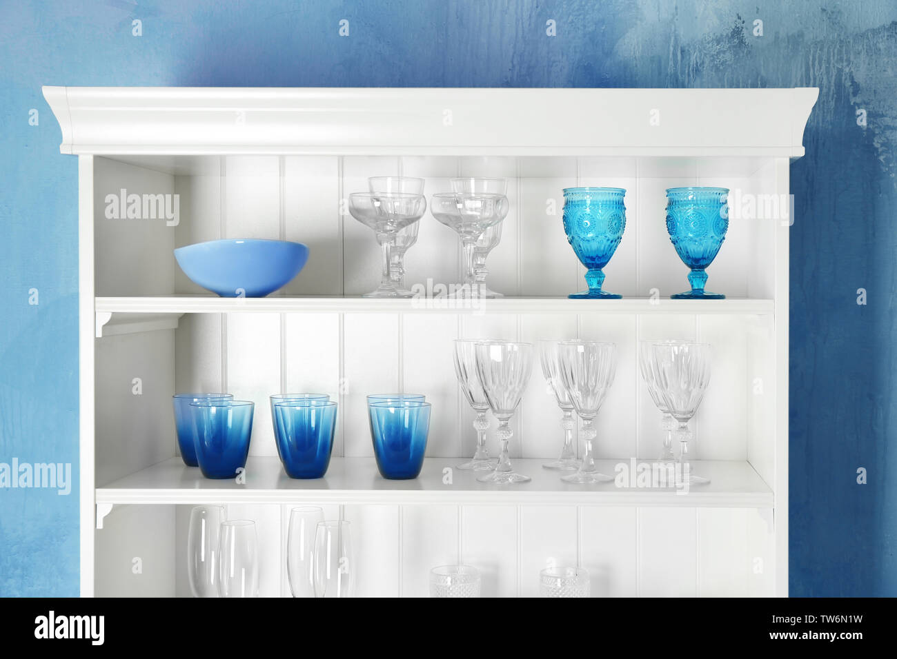 White storage stand with glassware in kitchen Stock Photo - Alamy