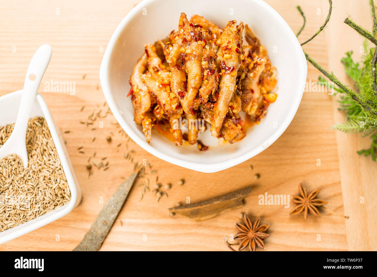 Spicy chicken paws Stock Photo - Alamy