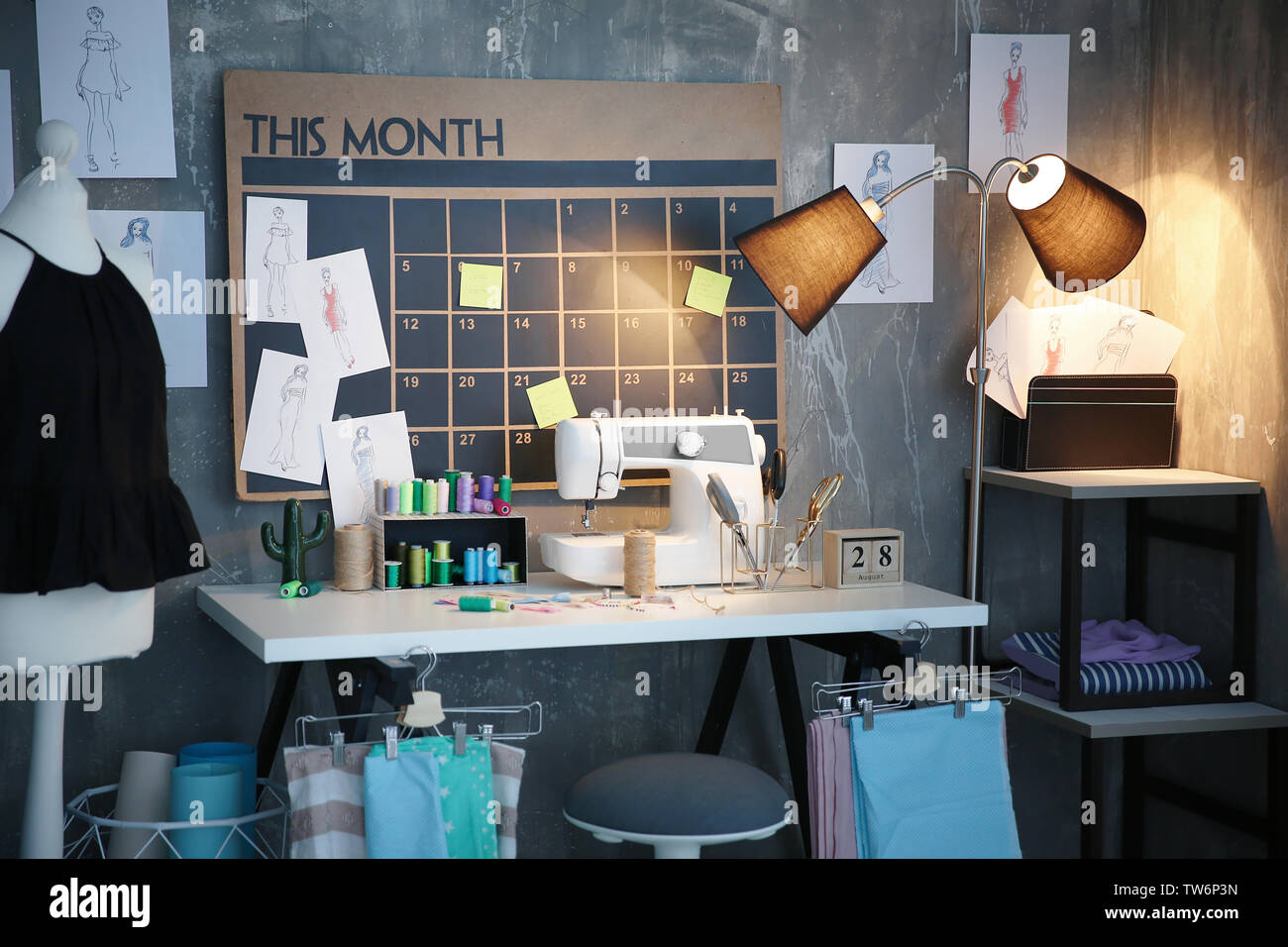 Modern tailor's workshop Stock Photo - Alamy