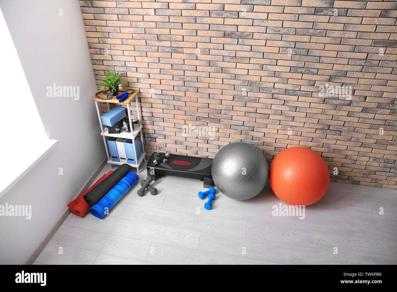 Different physiotherapy equipment in room Stock Photo - Alamy