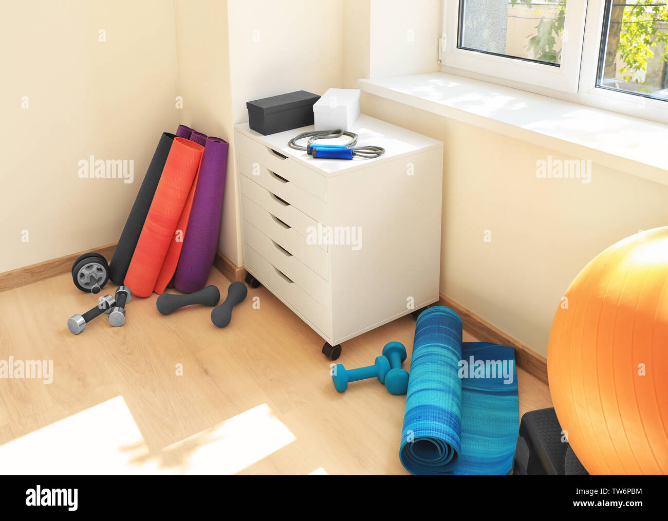 Different physiotherapy equipment in room Stock Photo - Alamy