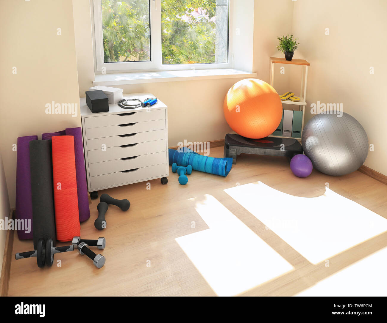 Different physiotherapy equipment in room Stock Photo - Alamy
