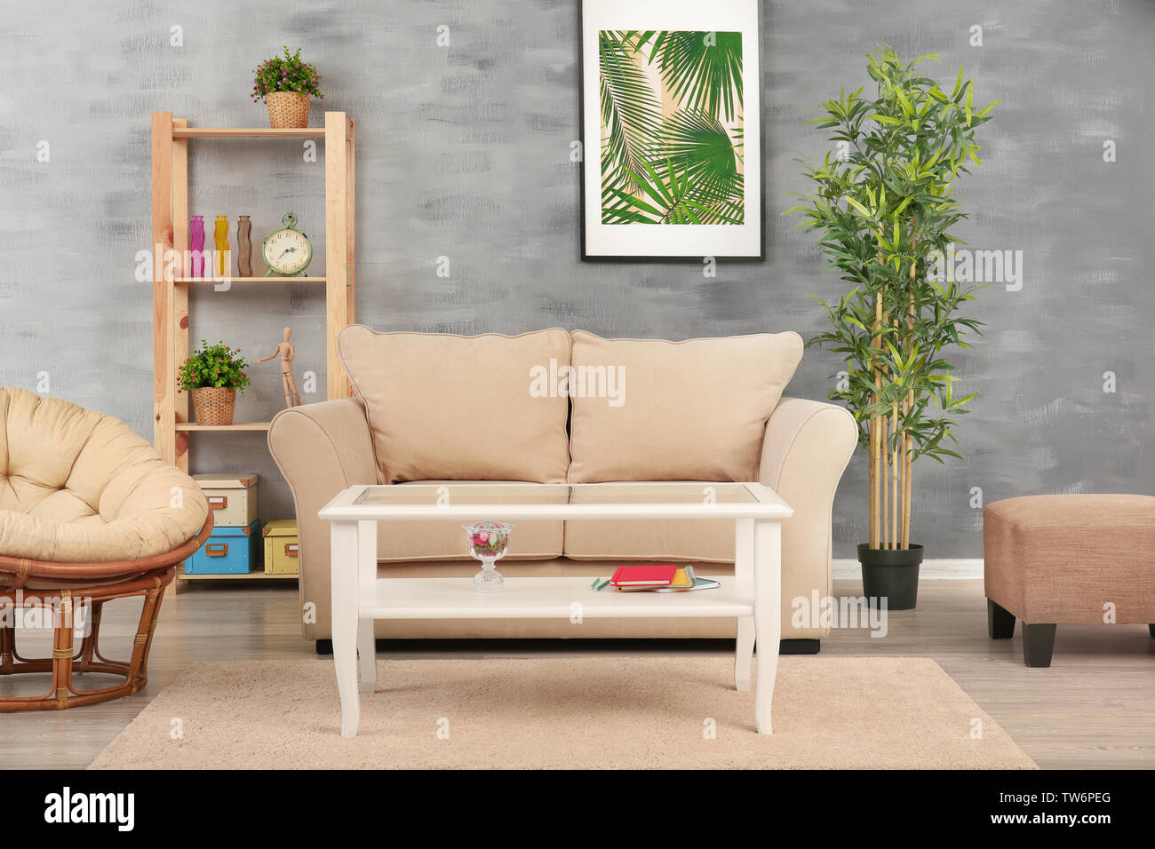 Modern living room with cozy sofa Stock Photo - Alamy