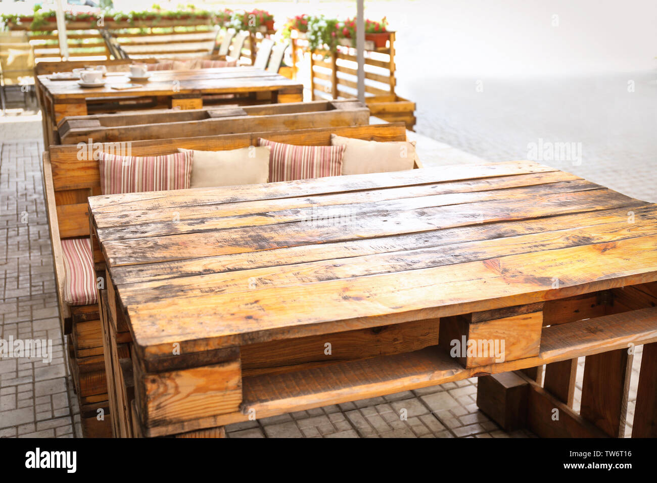 Outdoor cafe with furniture made of secondary raw materials Stock Photo ...