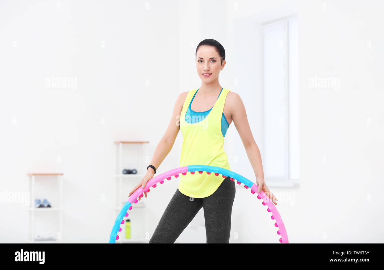 Woman doing hula hoop hi-res stock photography and images - Alamy