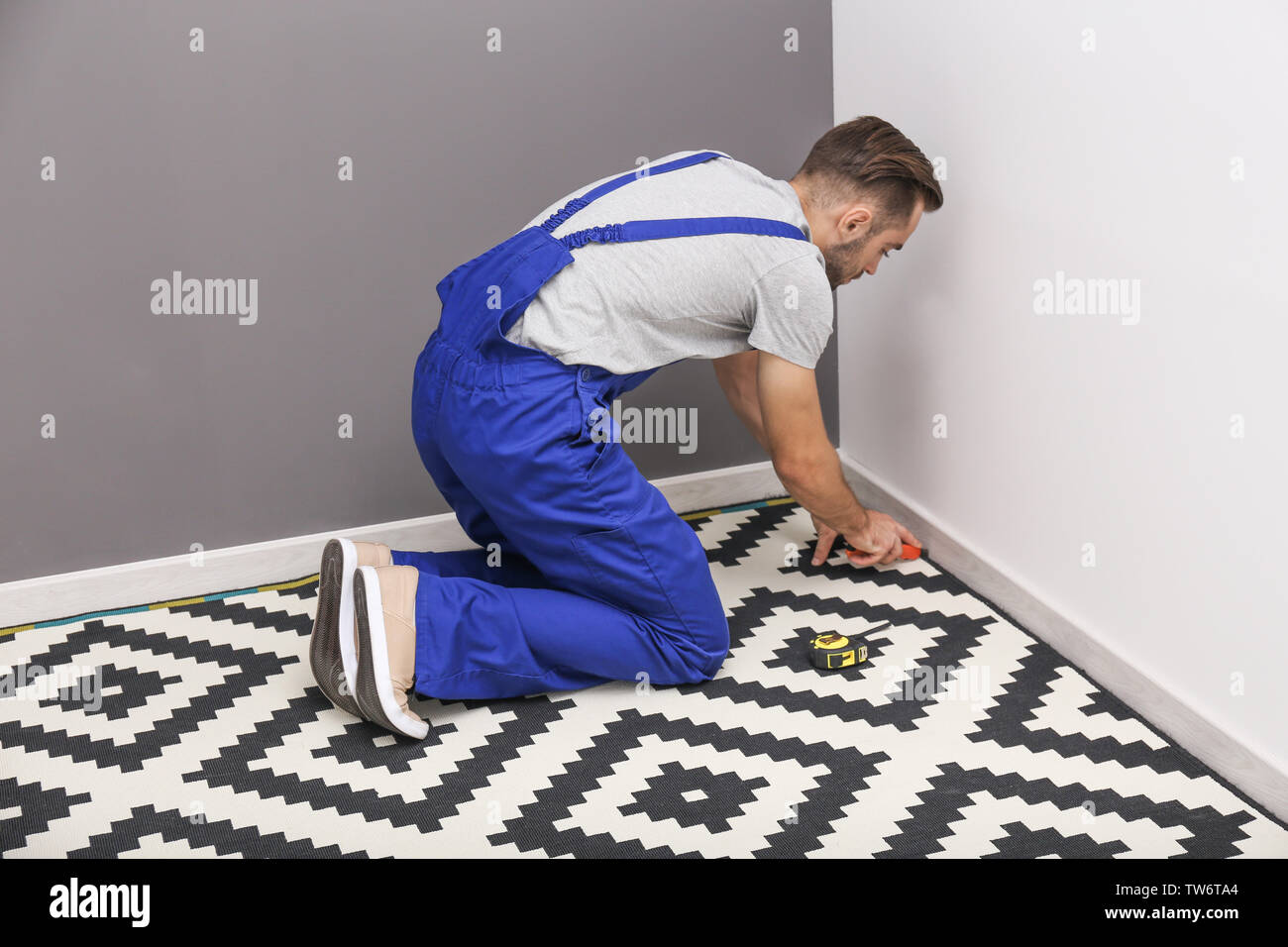 Cutting carpet tape hi-res stock photography and images - Alamy