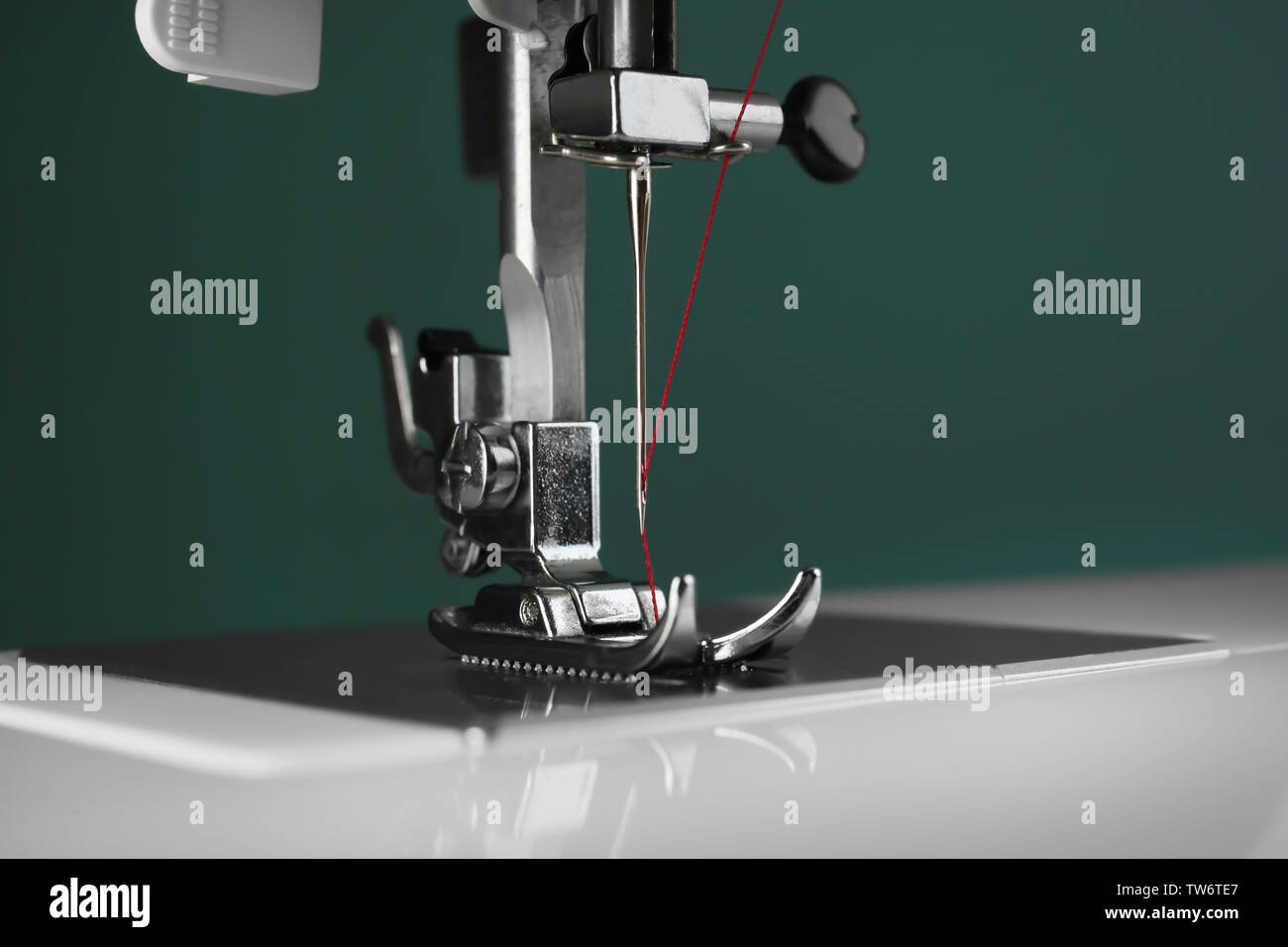 Sewing machine foot plate hi-res stock photography and images - Alamy