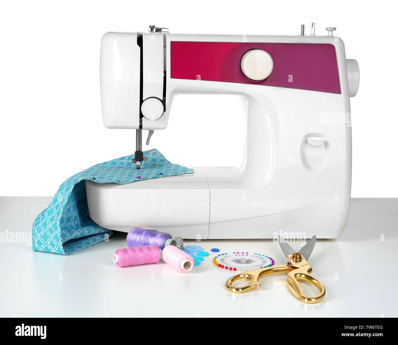 Sewing machine on white background Stock Photo - Alamy
