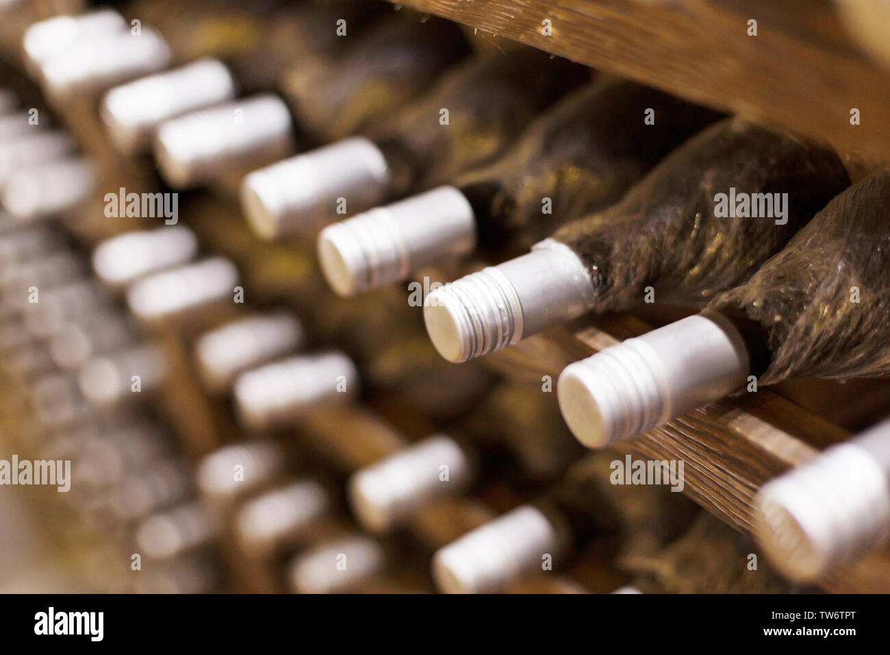 Wine cellar full of wine bottles Stock Photo - Alamy