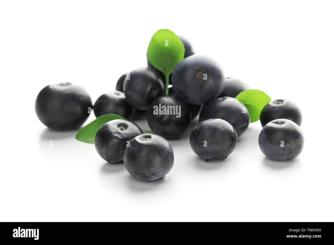Fresh acai berries, isolated on white Stock Photo - Alamy