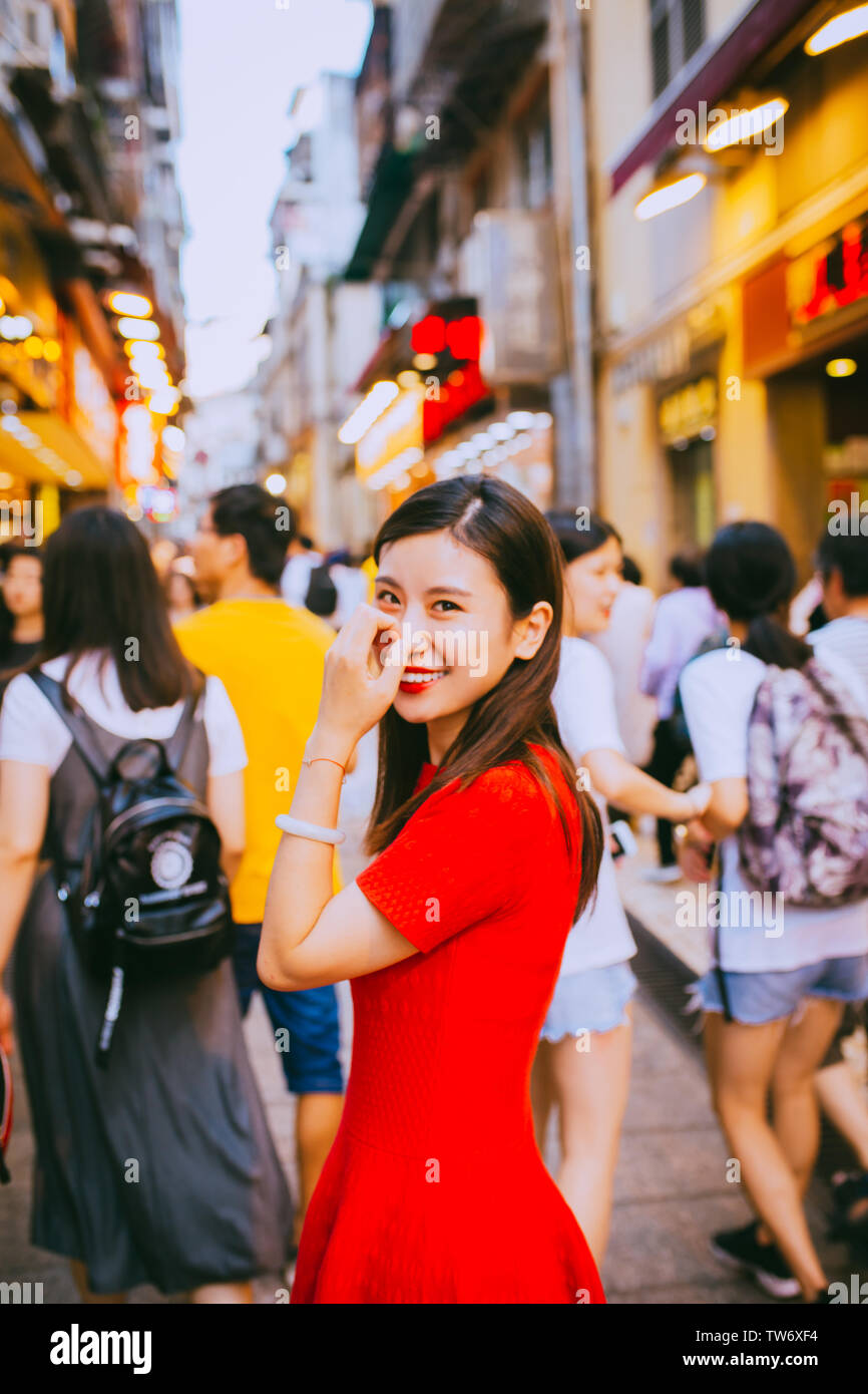 Red dress to Macau Stock Photo - Alamy