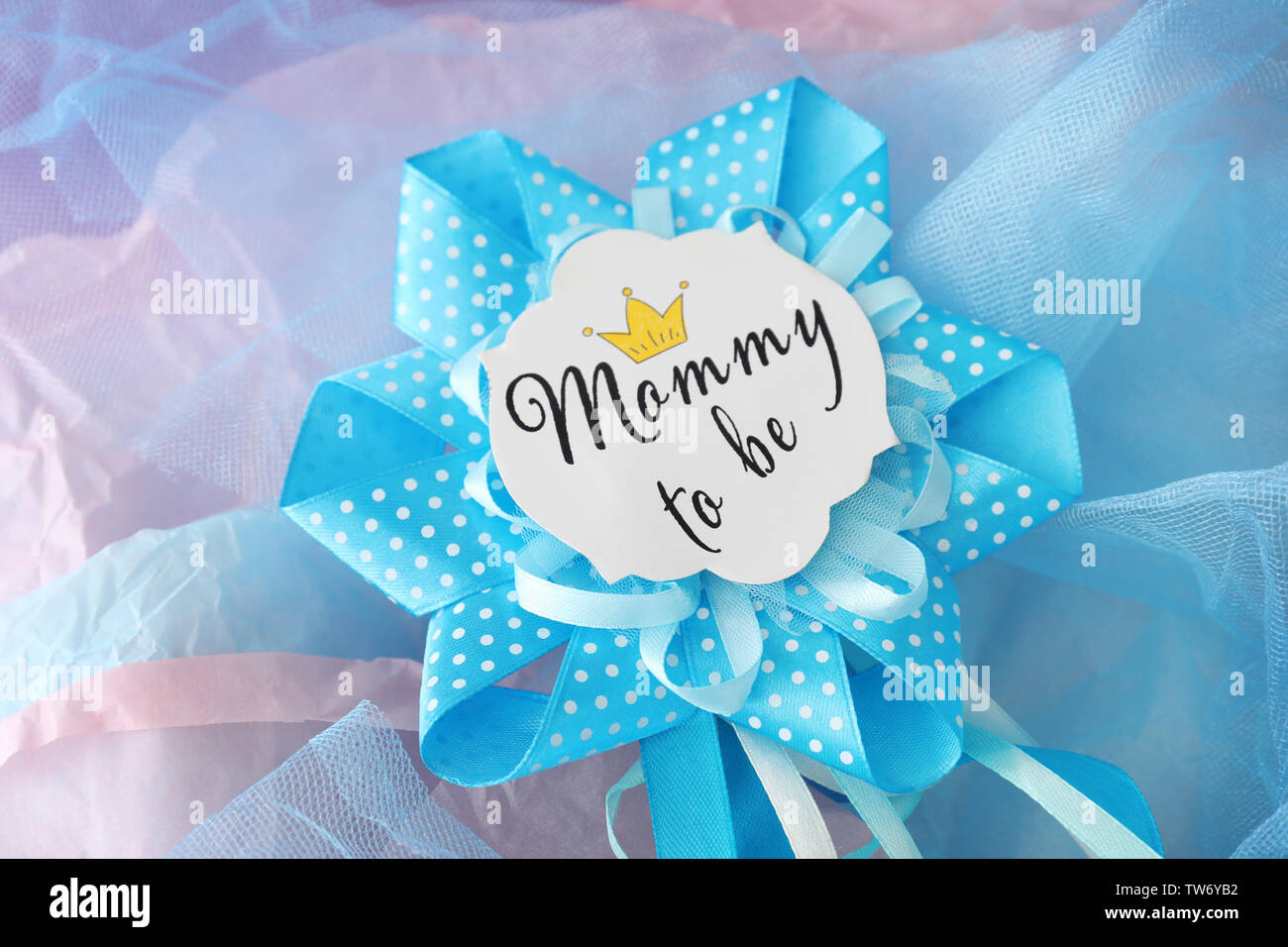 Award ribbon for baby shower party on tulle Stock Photo - Alamy
