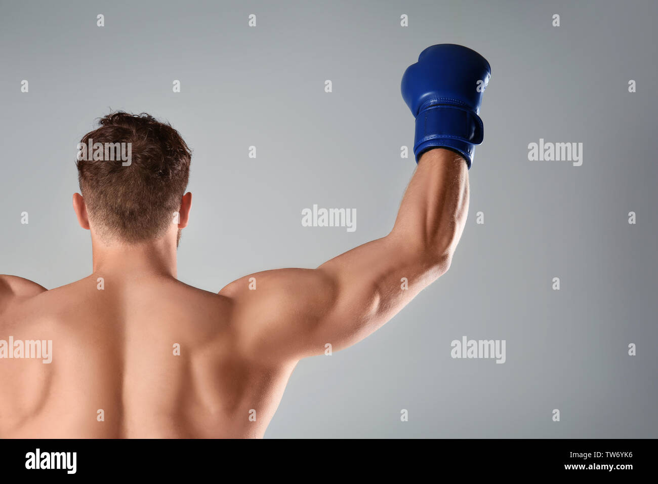 Male boxer on light background Stock Photo - Alamy
