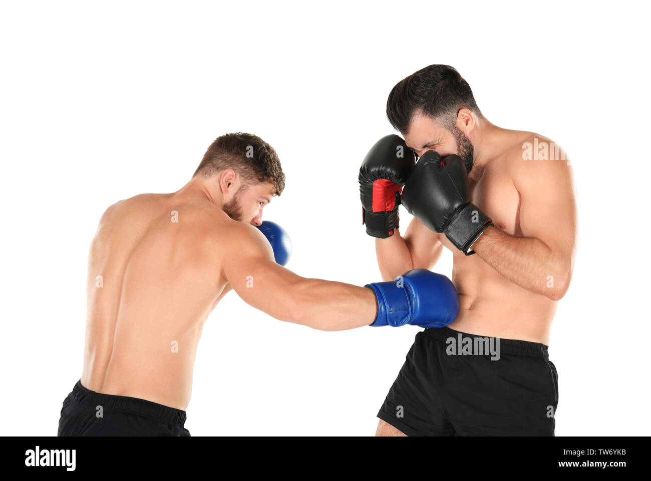 Male boxers fighting on white background Stock Photo - Alamy