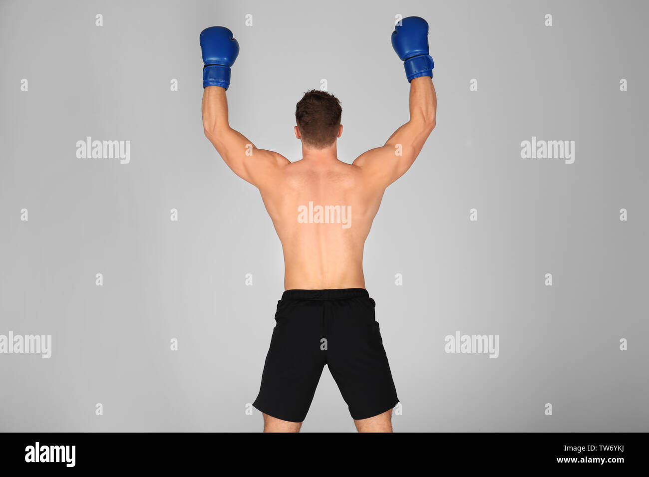 Male boxer on light background Stock Photo - Alamy