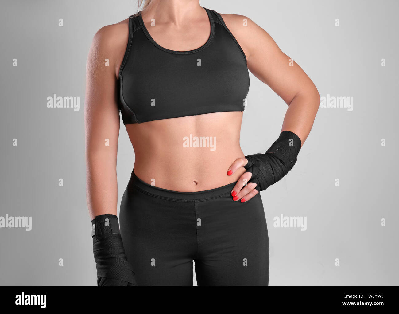 Female boxer on light background Stock Photo - Alamy