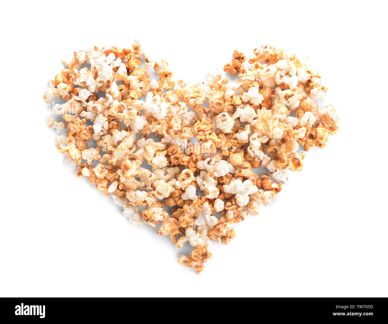 Heart made of tasty caramel popcorn on white background Stock Photo - Alamy
