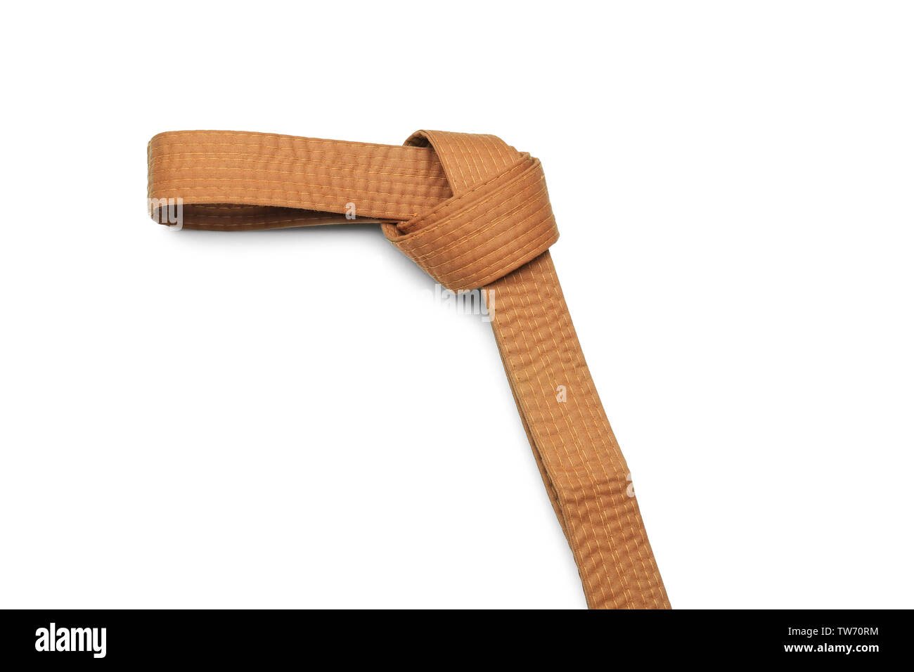 Brown karate belt on white background Stock Photo - Alamy
