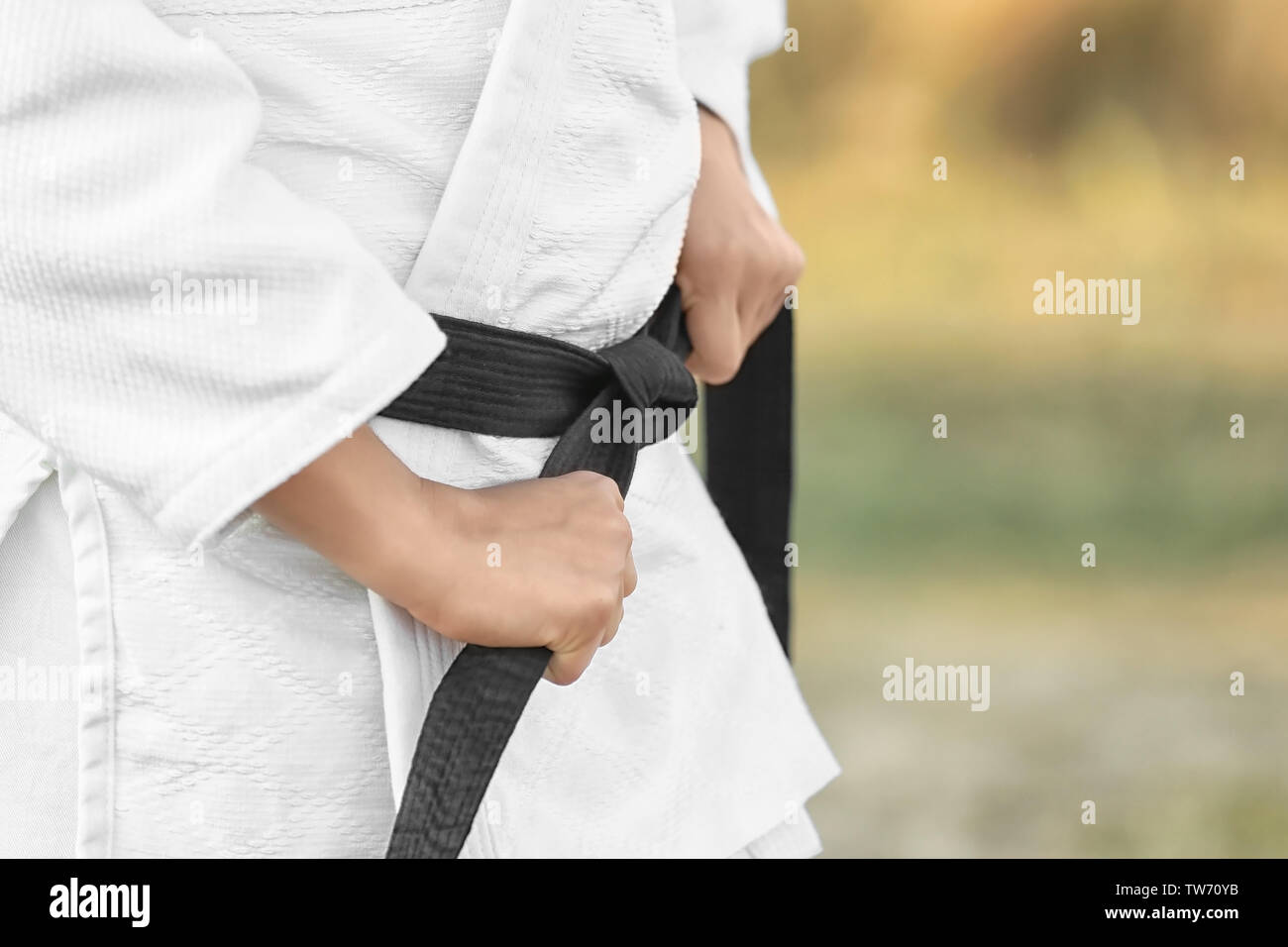 Female karate instructor outdoors, closeup Stock Photo - Alamy