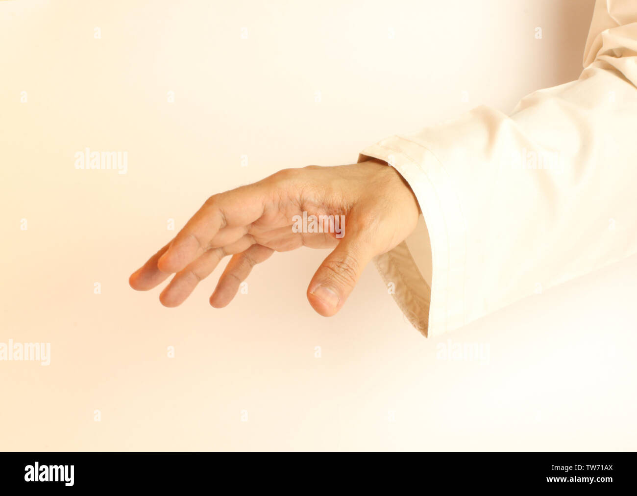 Arab Man wearing kandura Hand gesture series Stock Photo - Alamy